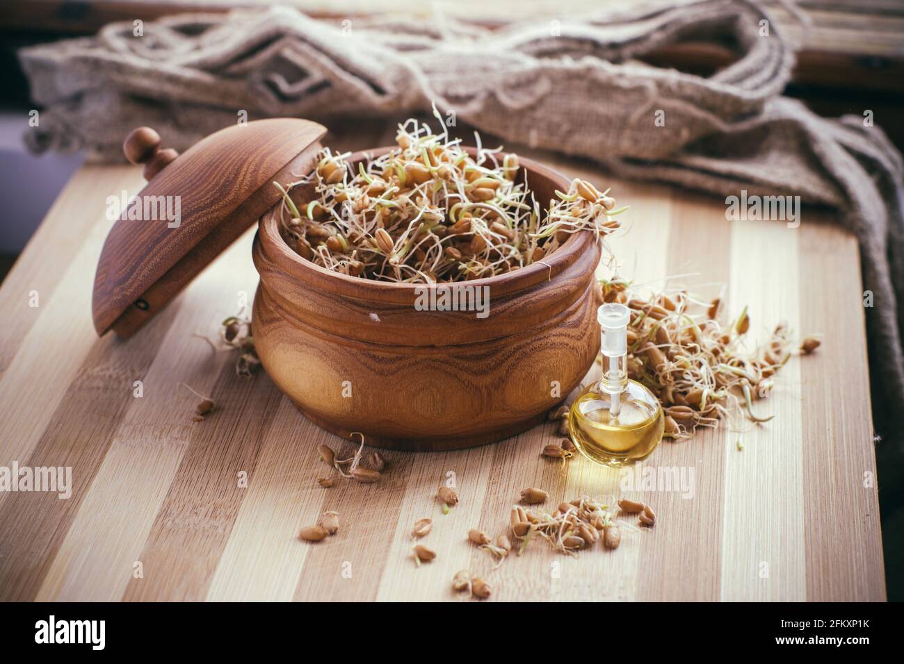 bottled wheat oil and grains Stock Photo - Alamy