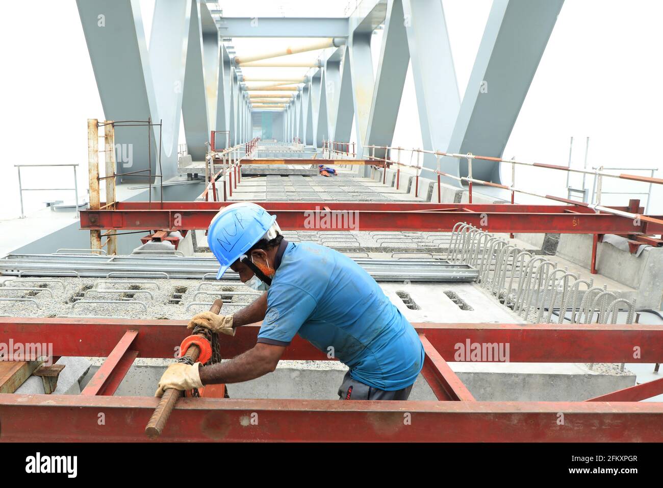 Dhaka, Bangladesh. 04th May, 2021. A worker seen working on the Padma bridge.The Planning ...
