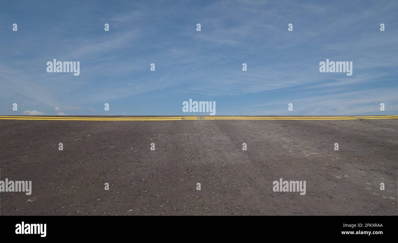 Grey tarmac paving and blue sky with copy space Stock Photo - Alamy