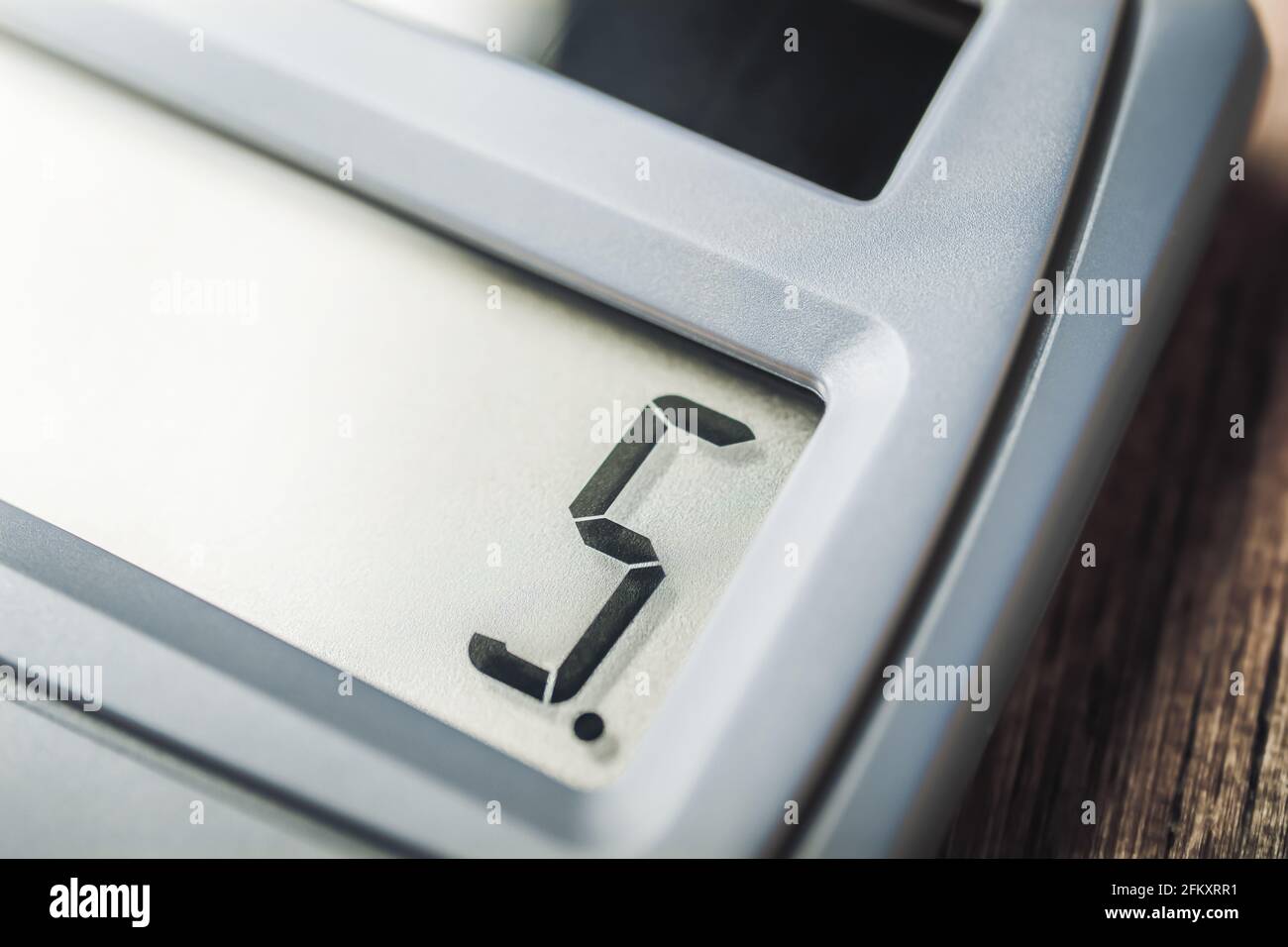 Number 5 On The Display Of A Solar Calculator Stock Photo - Alamy