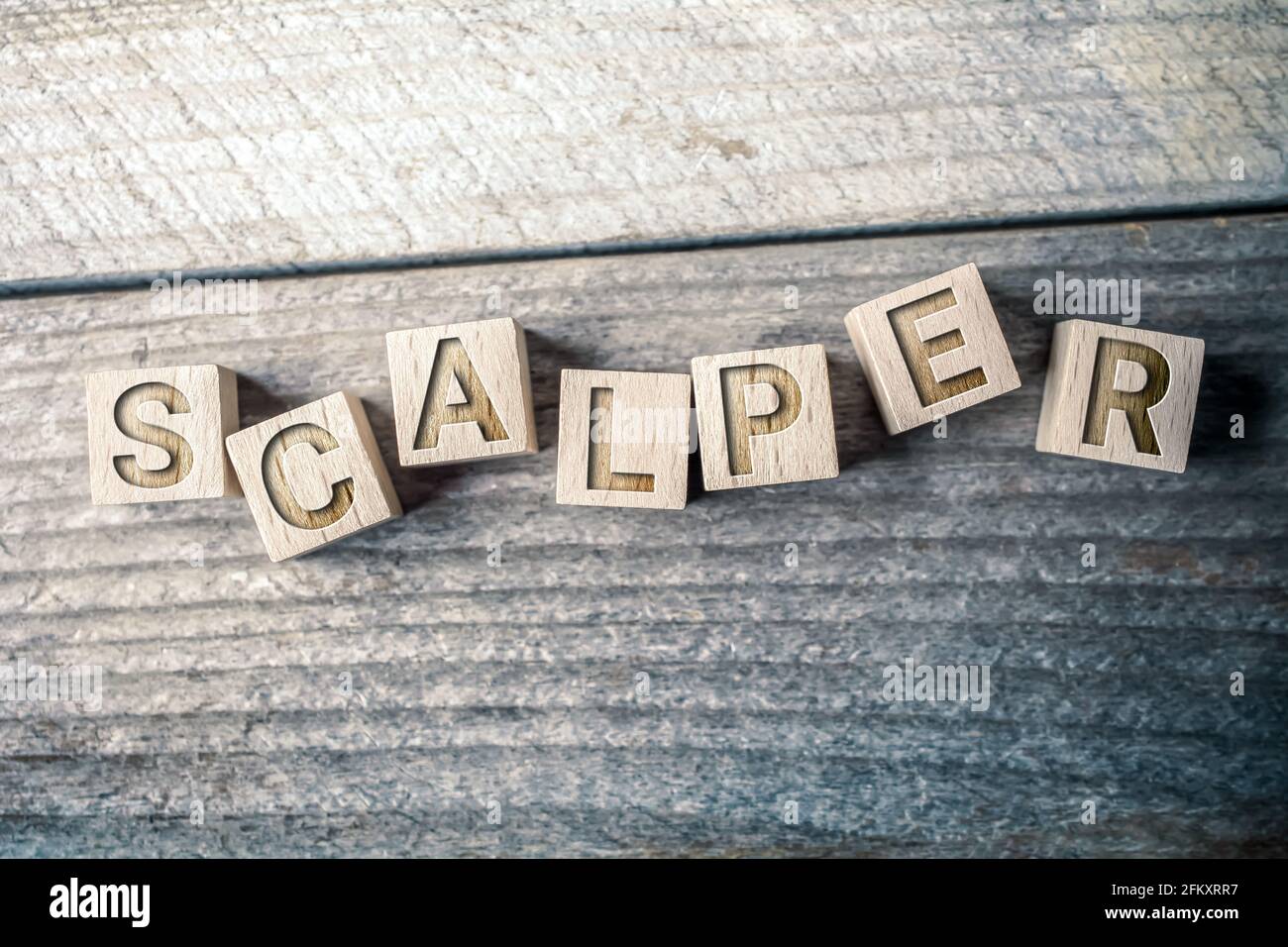 Scalper Written On Wooden Blocks On A Board Stock Photo - Alamy