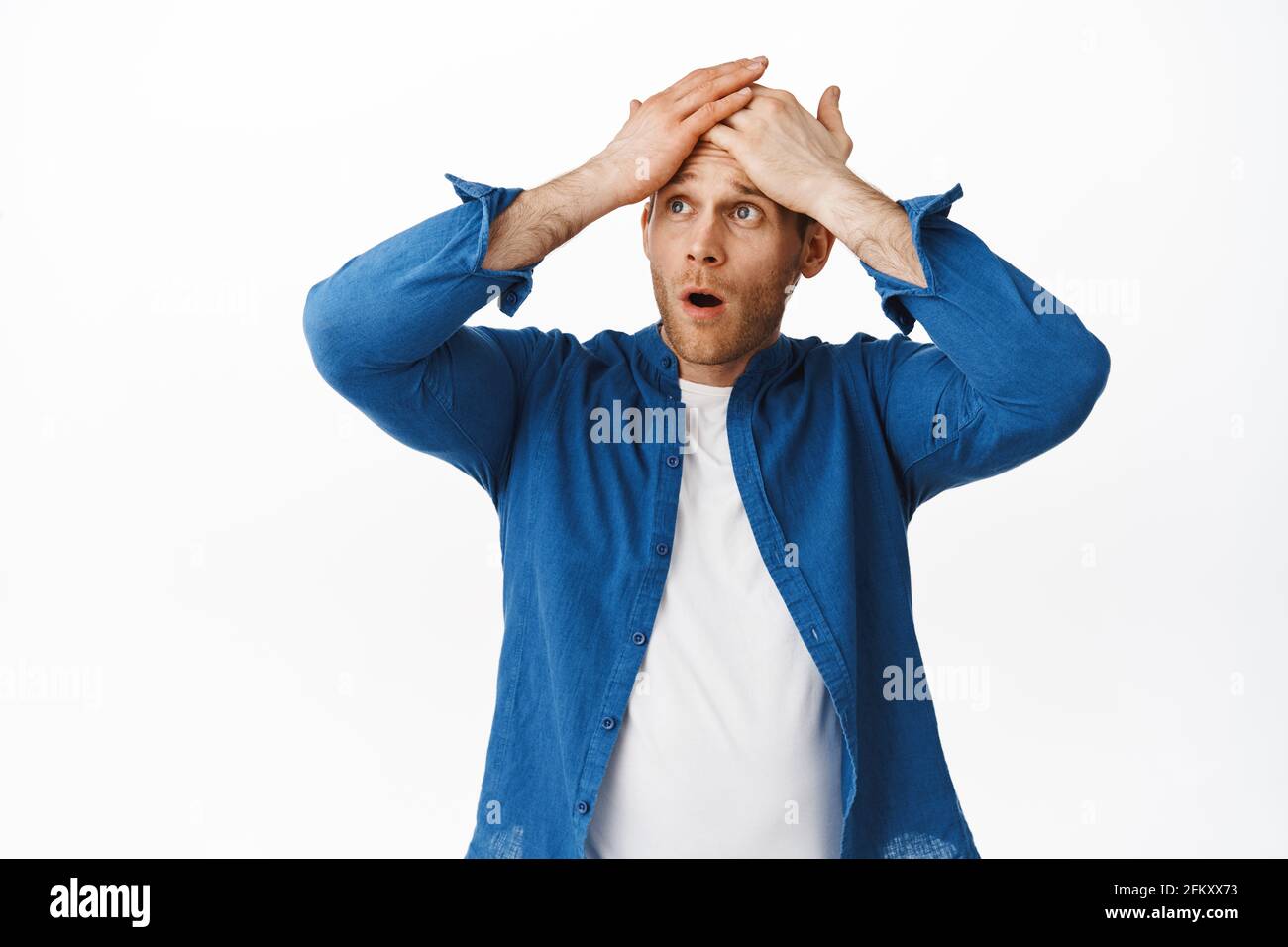 Shocking hand on the head hi-res stock photography and images - Alamy