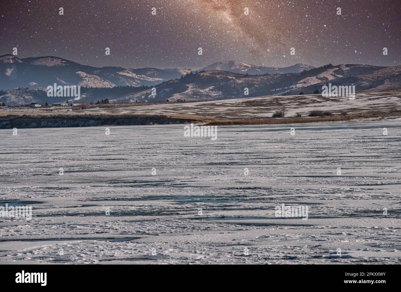 Frozen lake and mountains under the starry sky with Milky Way Stock ...