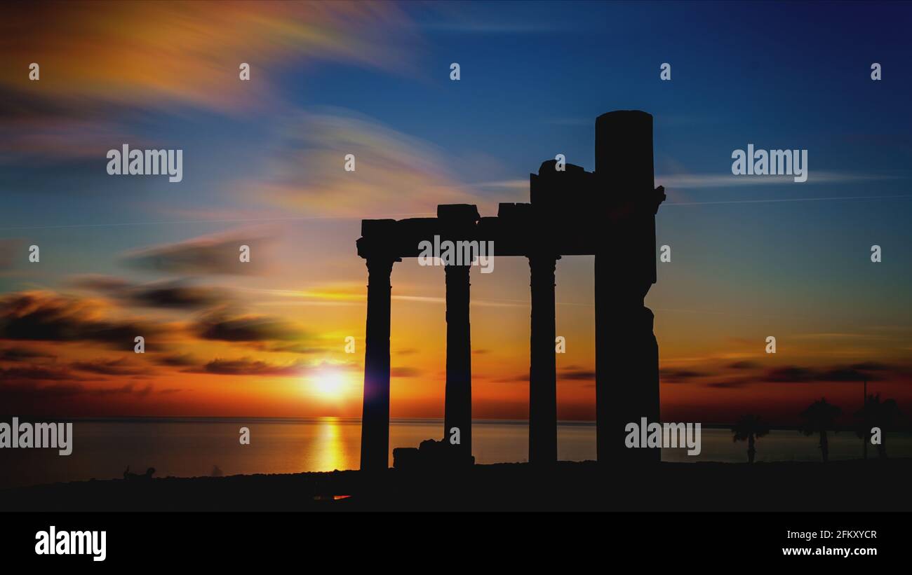 Beautiful sunset sky with antique ruins of columns, twilight sky ...