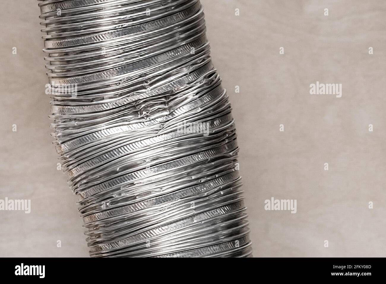 Ventilation damaged pipe system in an industrial plant, close-up of a ...