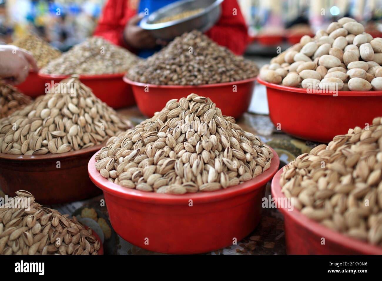 The almond with shell at a Khujand market, Tajikistan Stock Photo - Alamy
