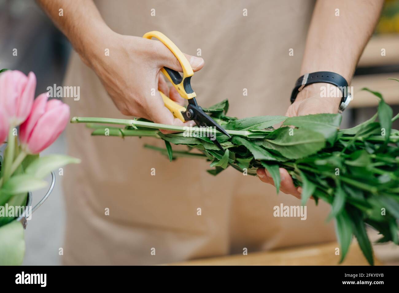 Gardener, owner, seller makes bouquet for clients online ordering Stock ...