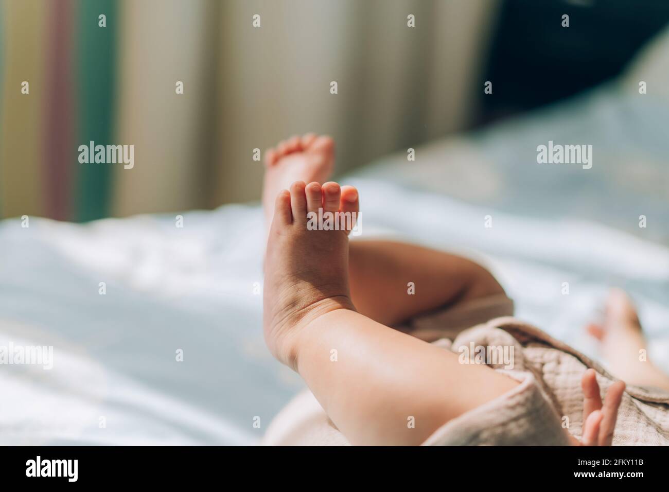 Child adoption and In Vitro Fertilization IVF . Asian child lying on ...