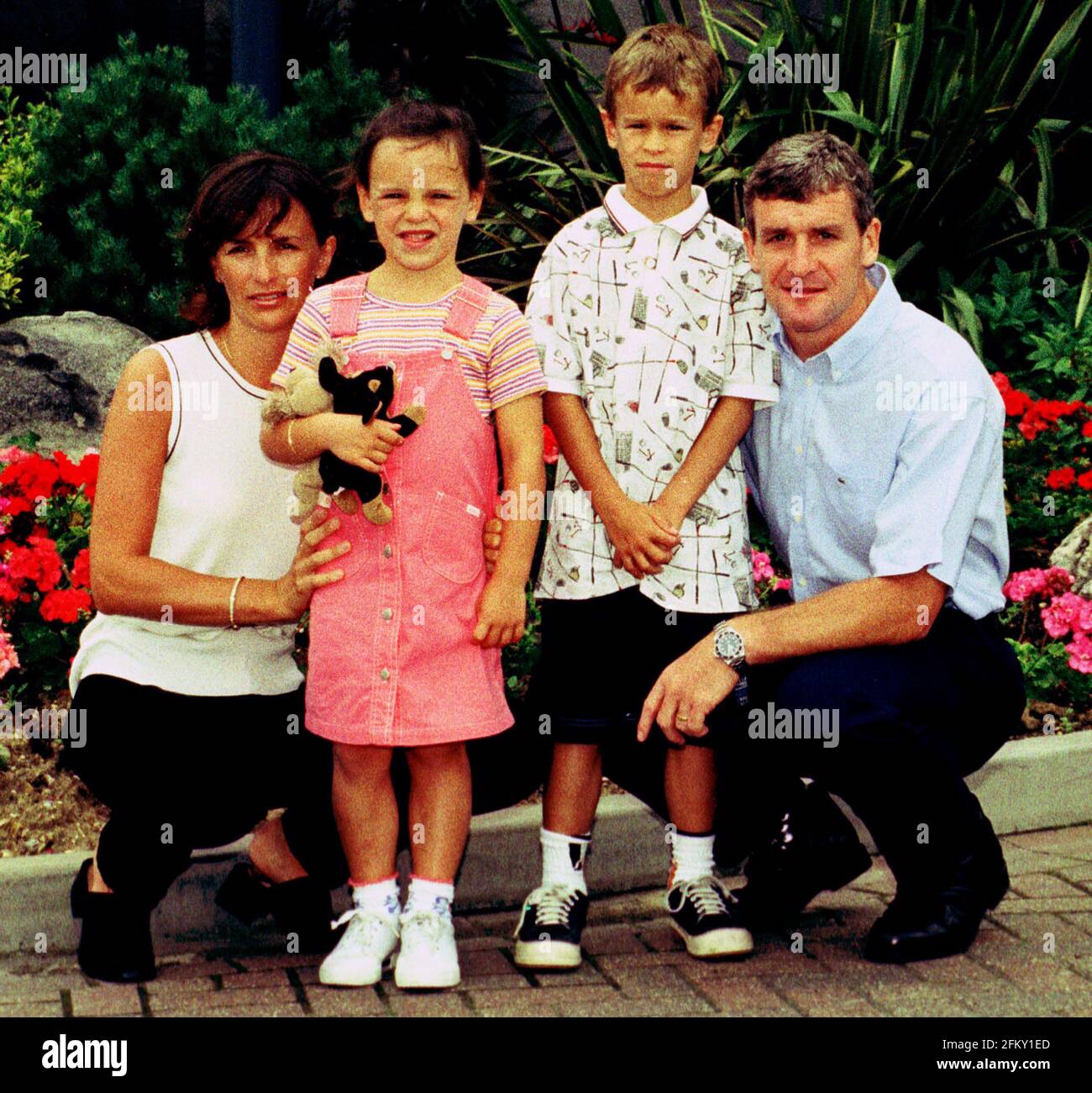MARK HUGHES WITH WIFE JILL AND CHILDREN CURTIS (8) AND XENNA (5) AFTER ...