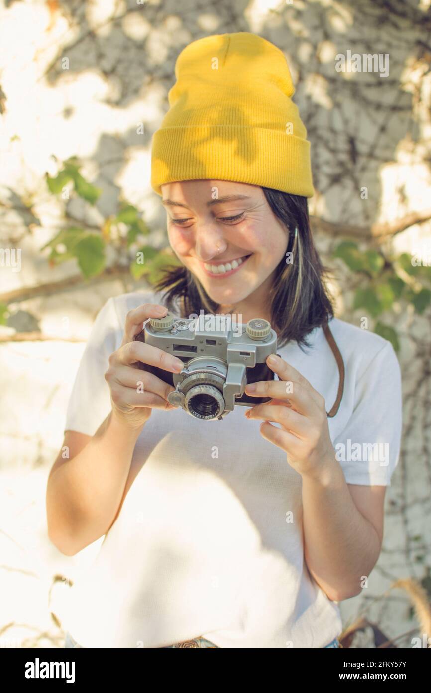 Woman with old camera Stock Photo - Alamy