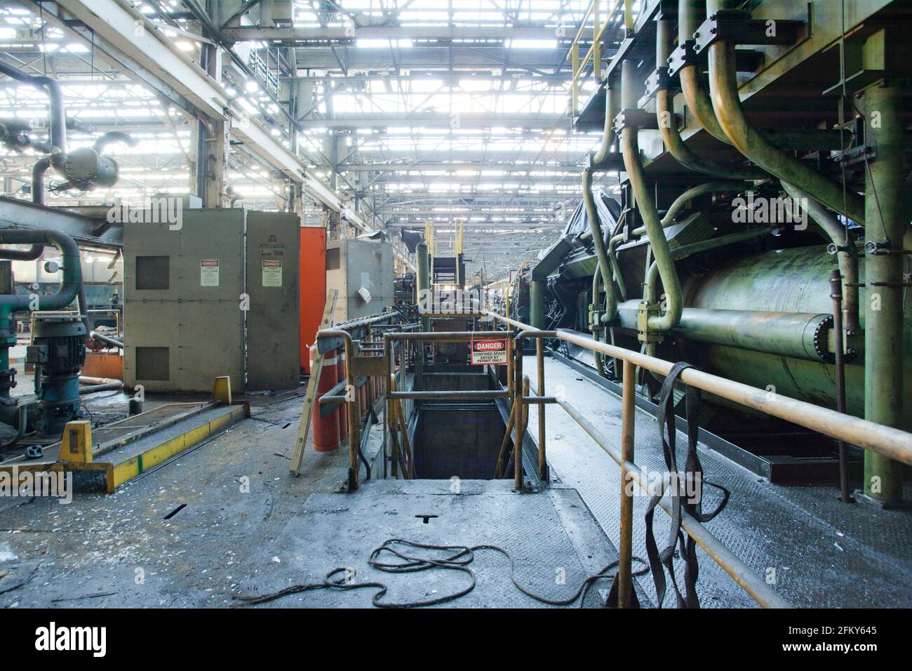 Interior view of an abandoned decaying industrial factory Stock Photo ...
