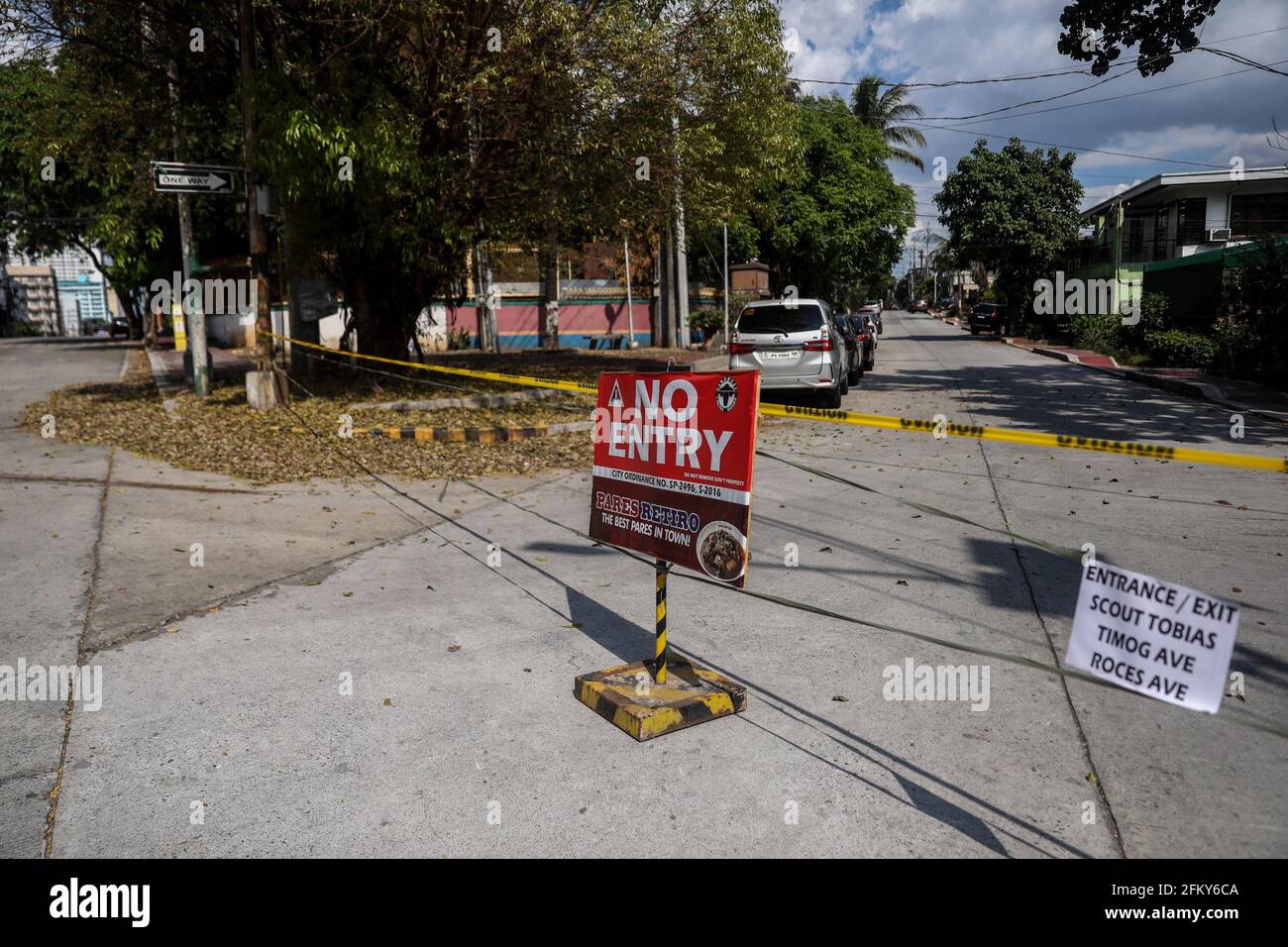 A street is cordoned off to prevent the spread of COVID-19 during the ...