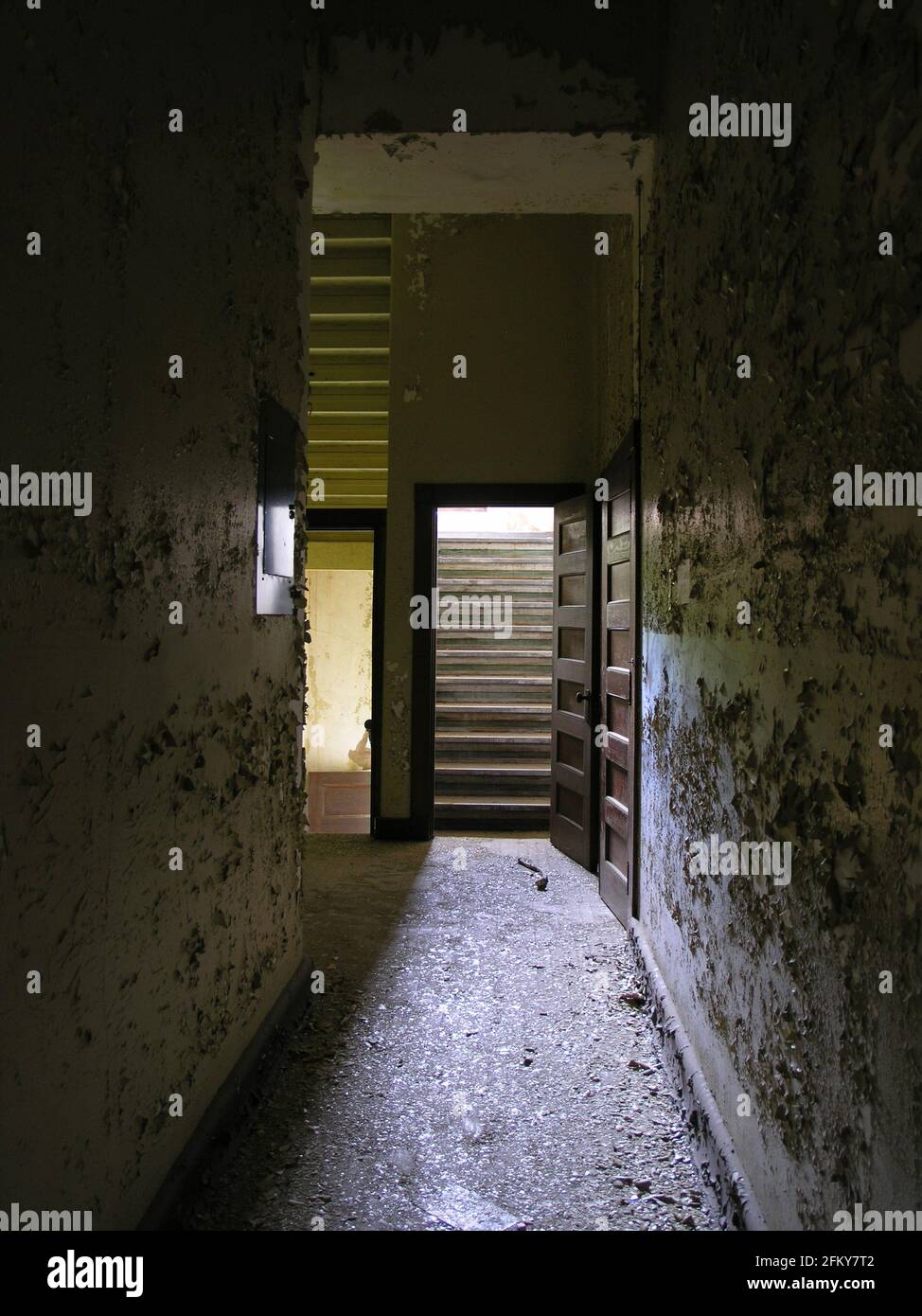 Interior of an abandoned decaying insane asylum Stock Photo - Alamy