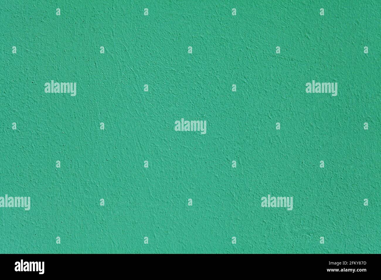 Green wall, texture, background. The building wall, painted with water ...