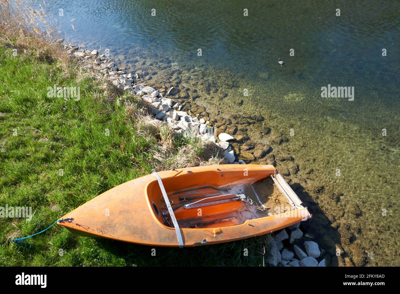 High angle shot of a boat on the lakeshore Stock Photo - Alamy