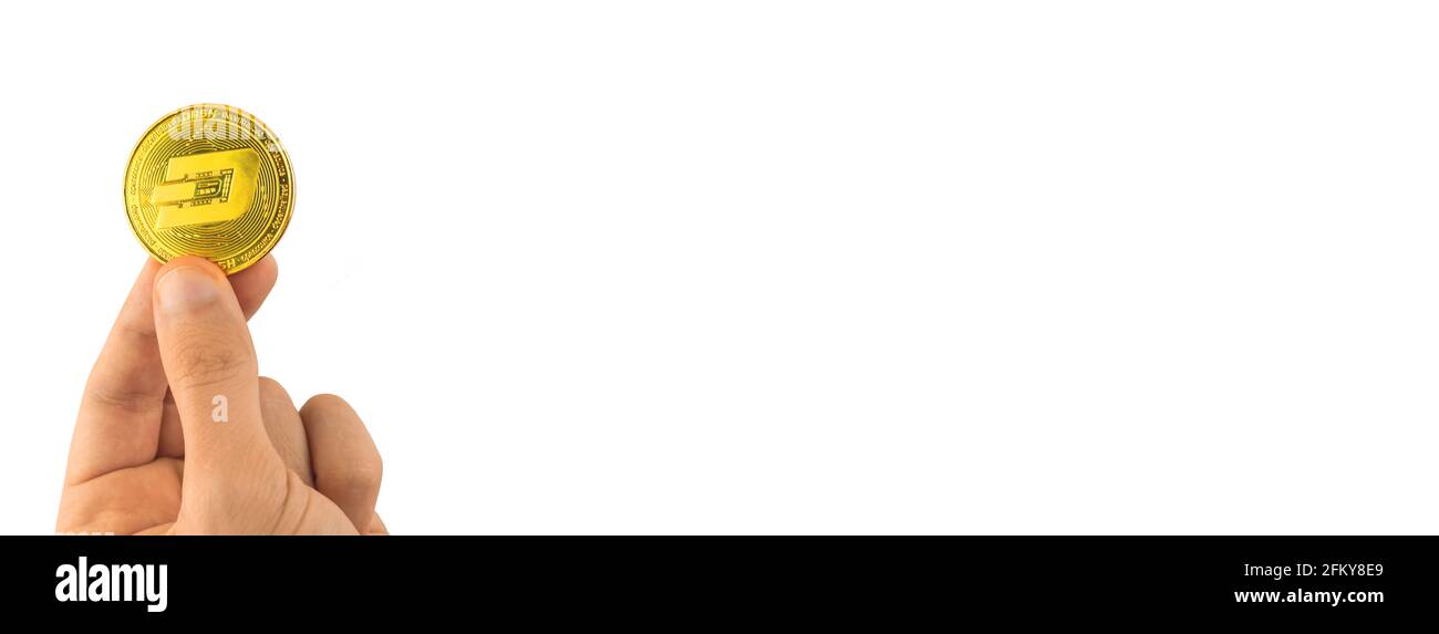 Golden Dash coin in hand banner photo isolated on white background ...