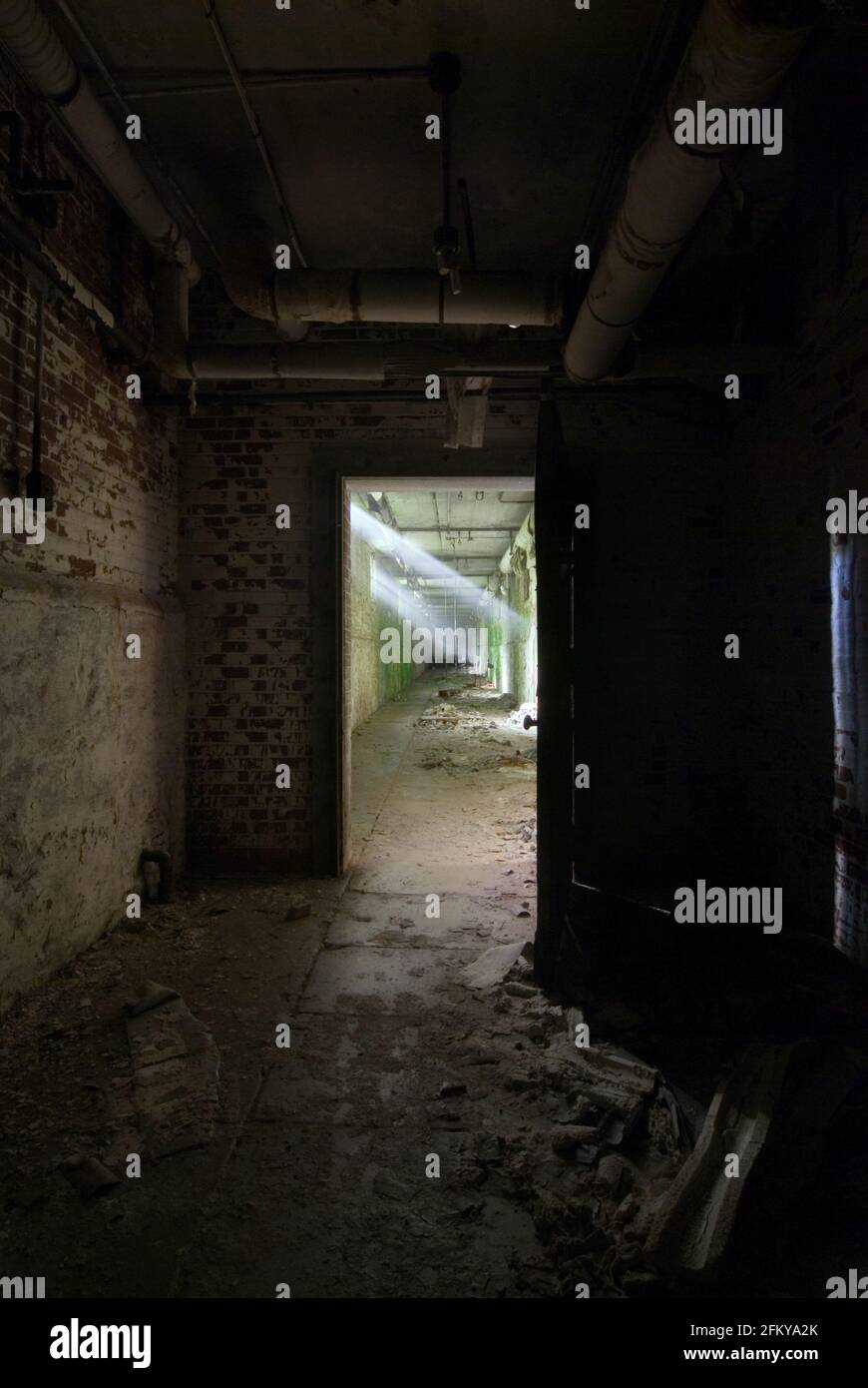 Interior of an abandoned decaying insane asylum Stock Photo - Alamy