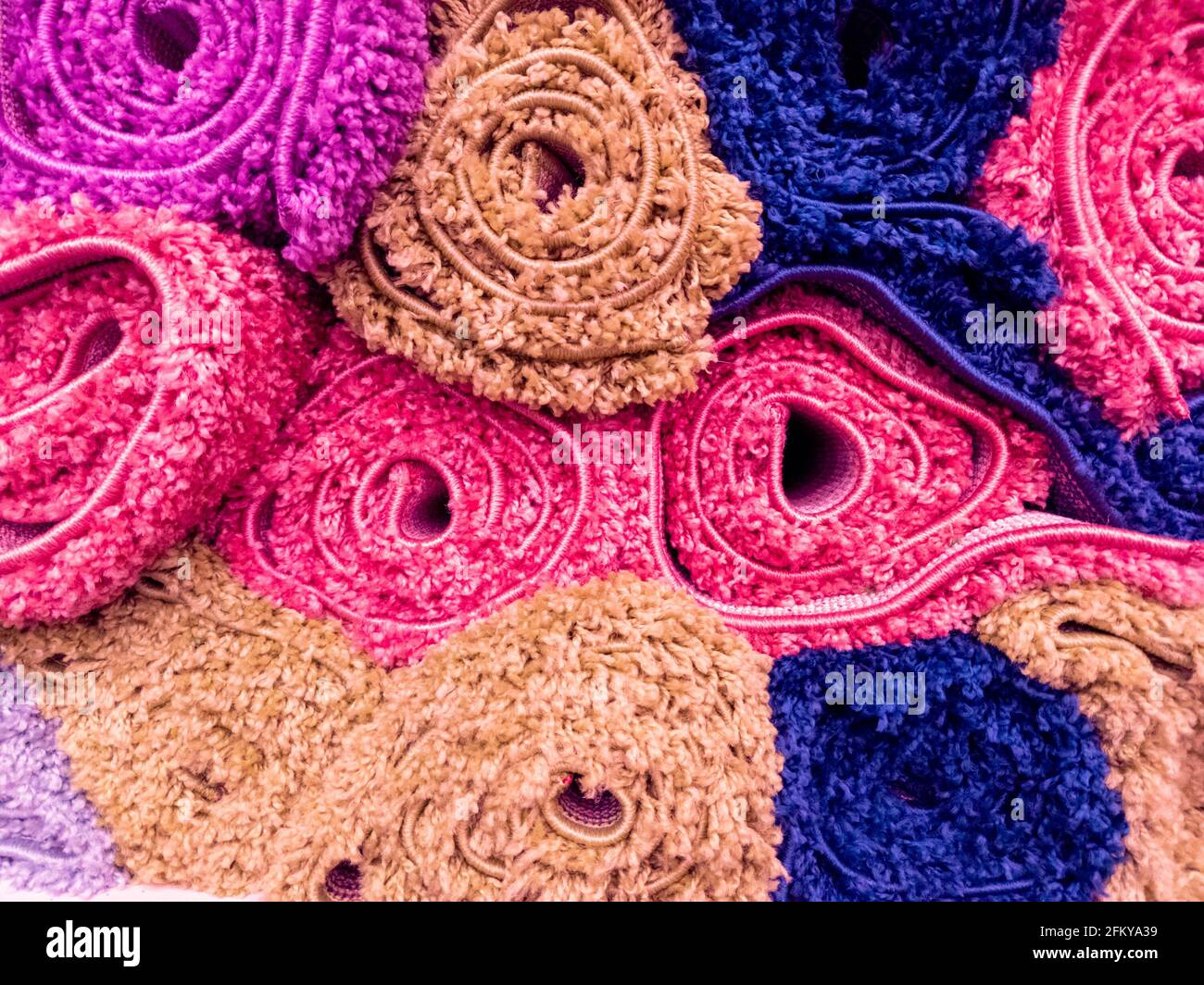 close-up full frame background of colored carpet rolls stack Stock ...
