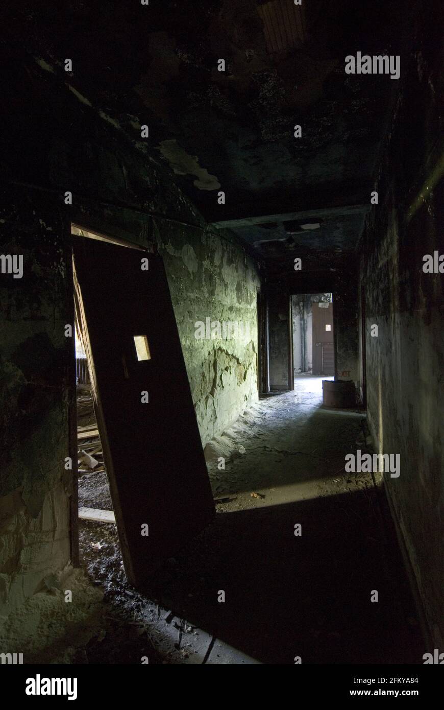 Interior of an abandoned decaying insane asylum Stock Photo - Alamy