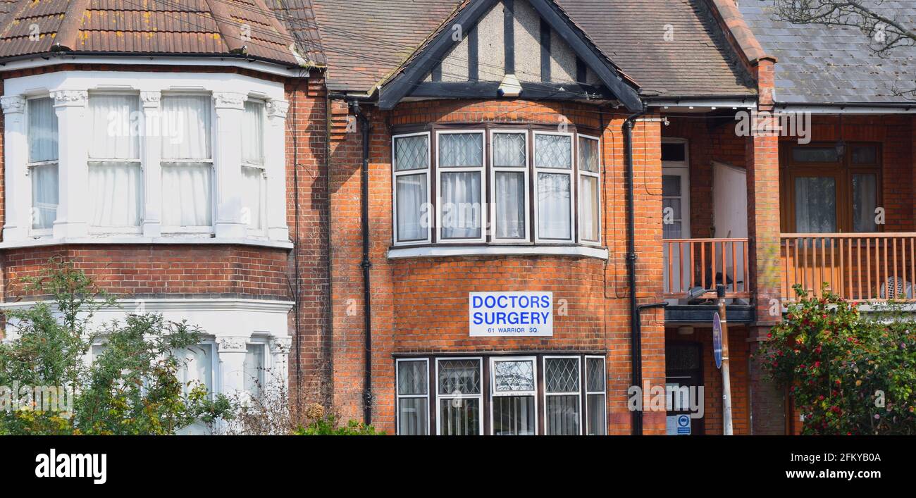 Street view with Doctors surgery in UK town Stock Photo - Alamy