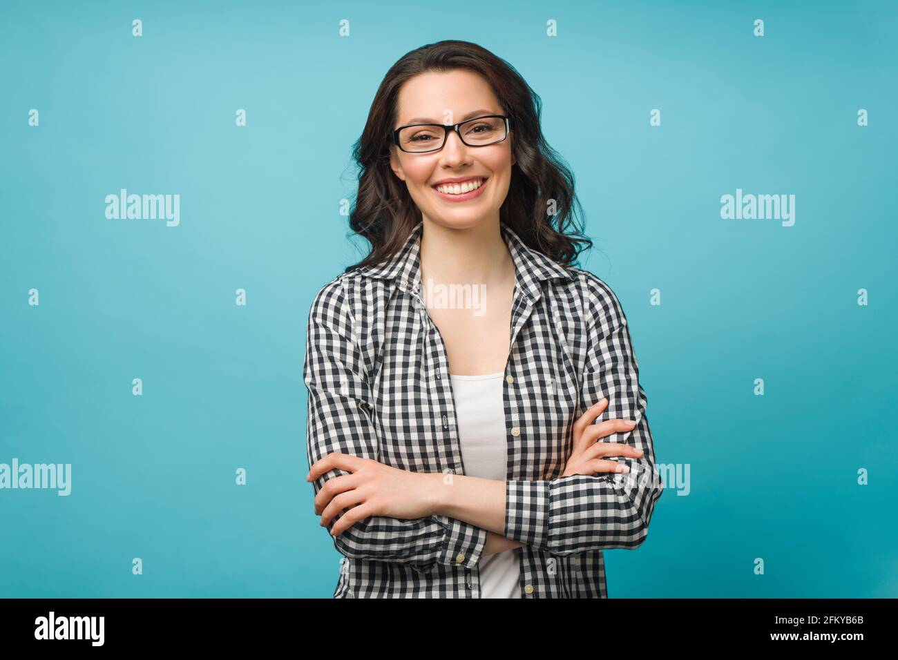 Cute happy girl crossing arms hi-res stock photography and images - Alamy