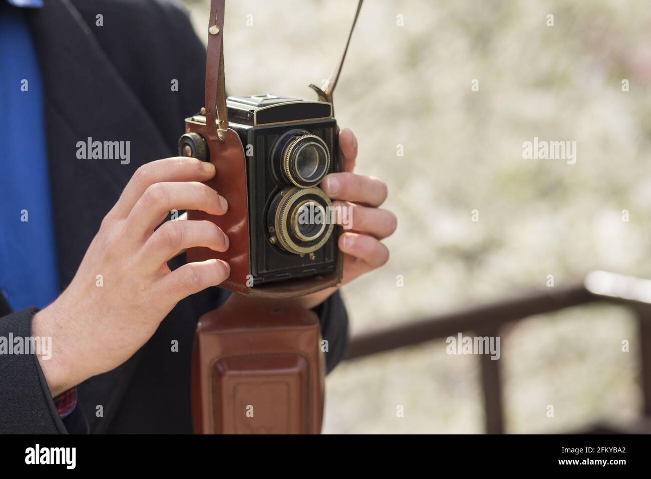 Person using an old vintage camera to take pictures Stock Photo - Alamy
