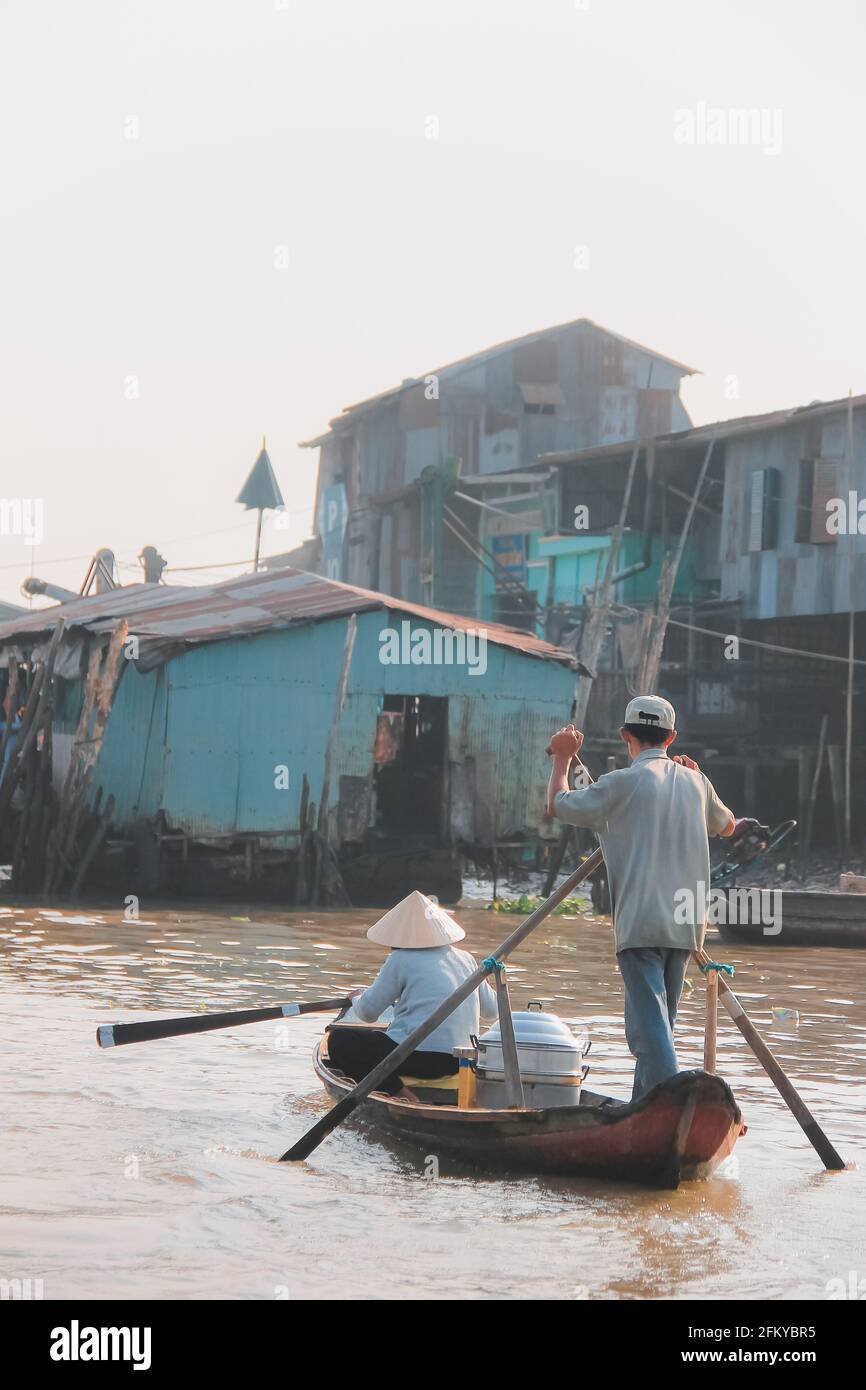 Can Tho, Vietnam - March 8 2019: A Vietnamese couple rowing a ...