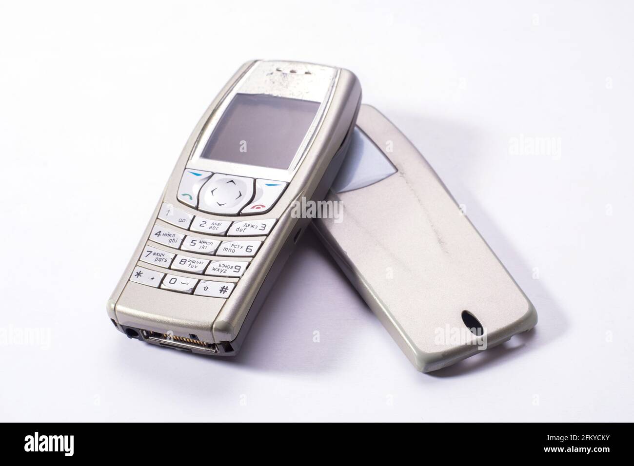 Old mobile push-button telephone. Personal phone with a small screen ...