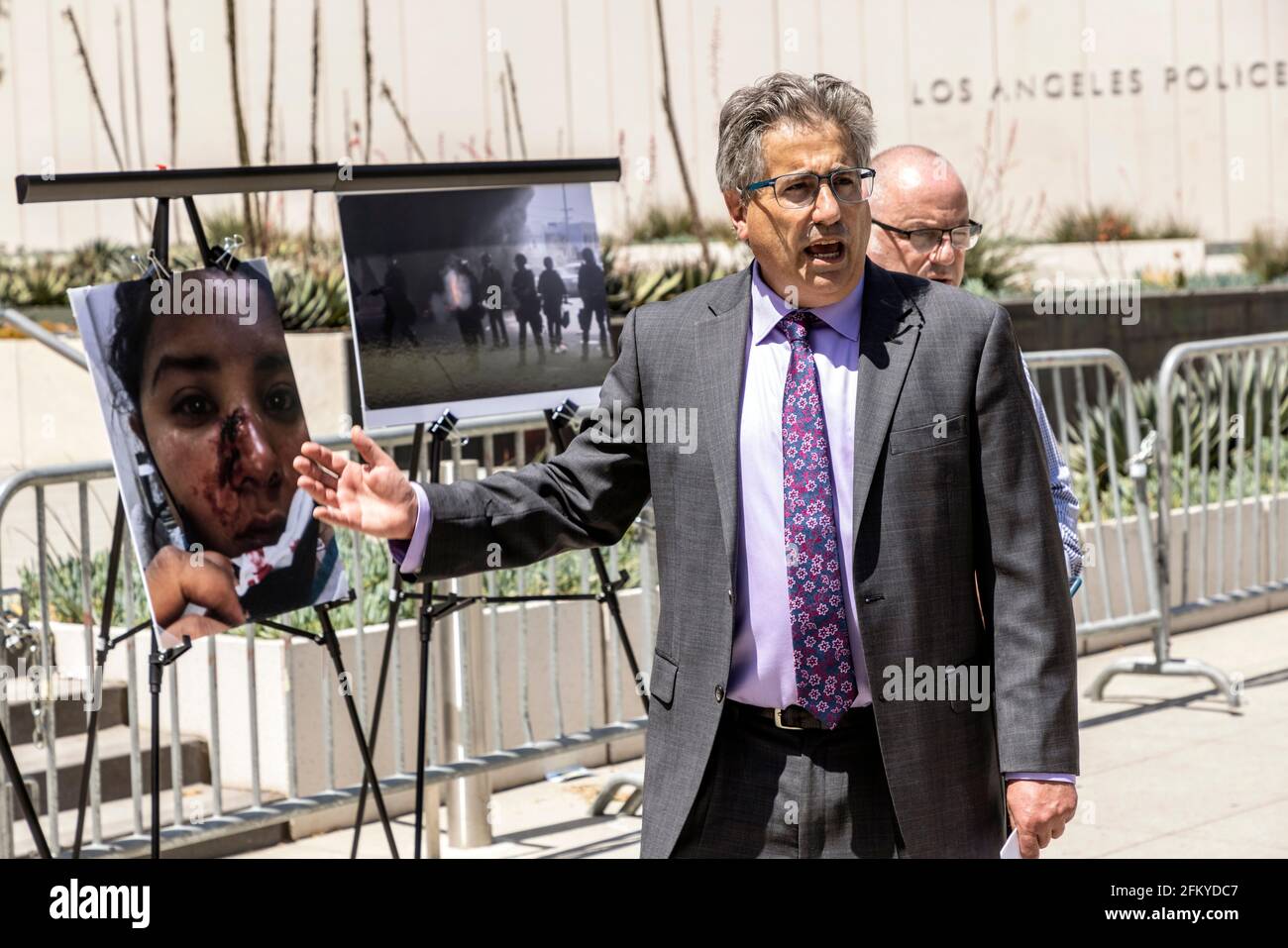 Journalist and activist file lawsuit over LAPD police abuse at George ...