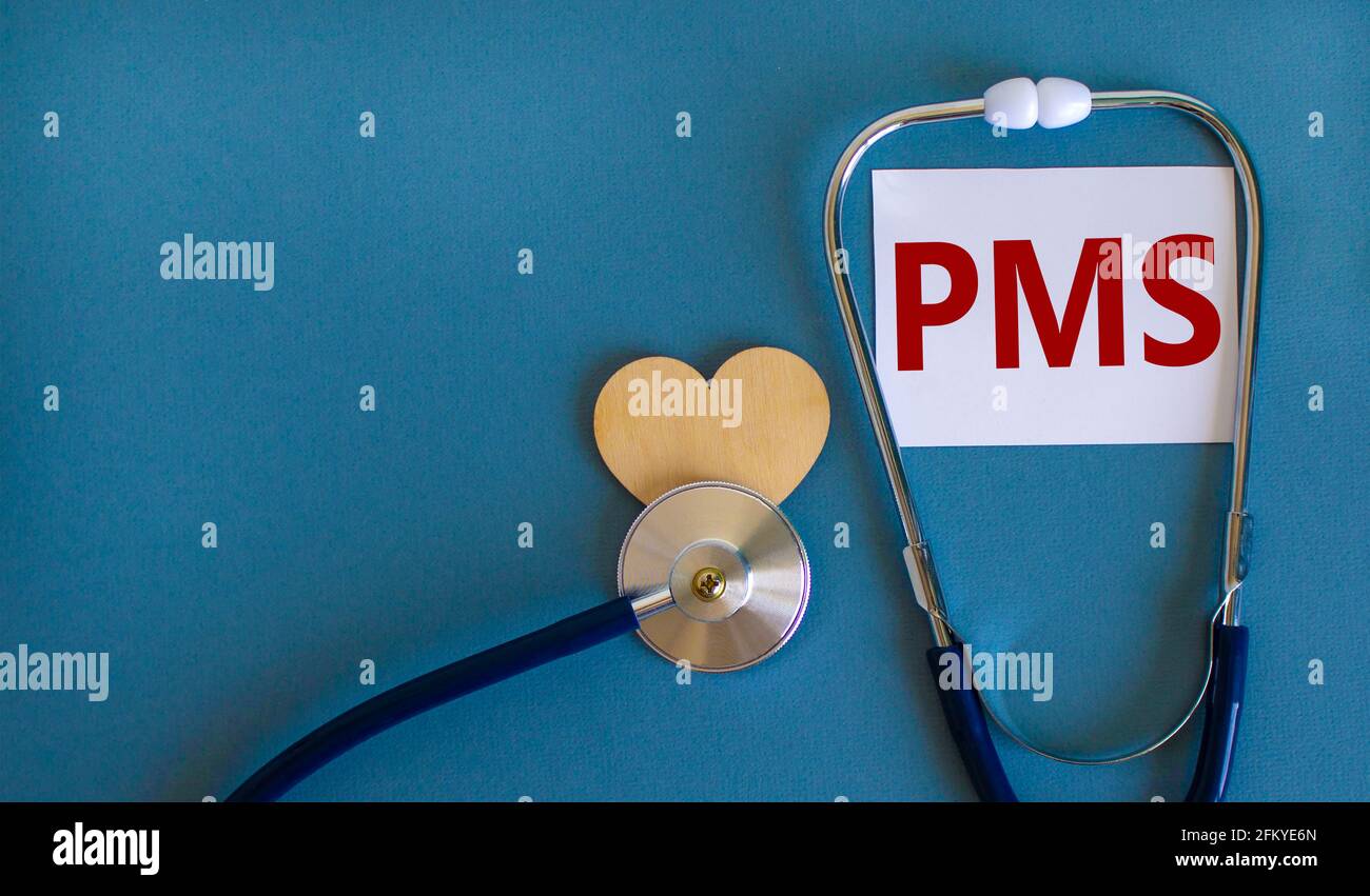 Medical and PMS, premenstrual syndrome symbol. White card with the word ...