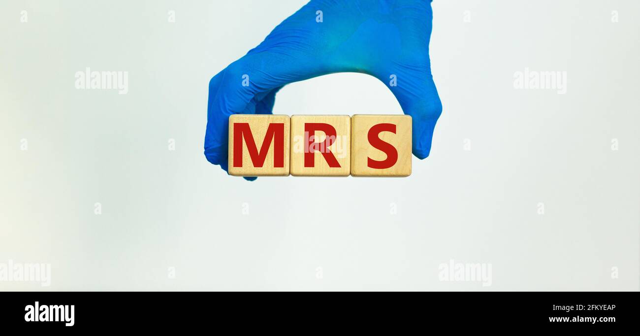 Medical and MRS menstrual related symptoms symbol. Doctor holds wooden ...