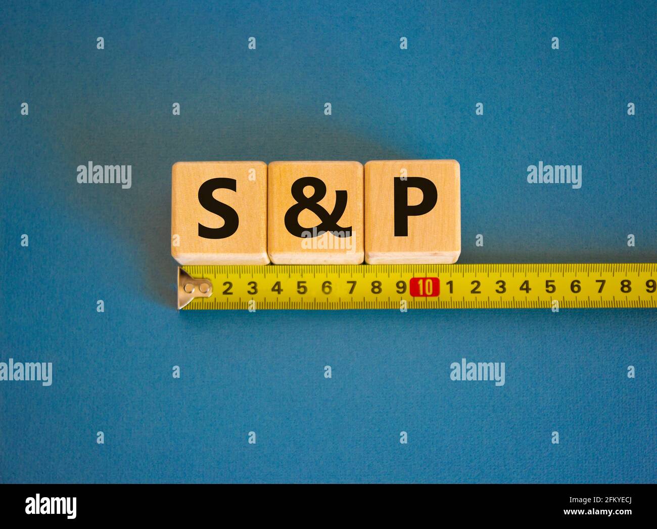 S and P 500 Index rates symbol. The word S and P on cubes arranged ...