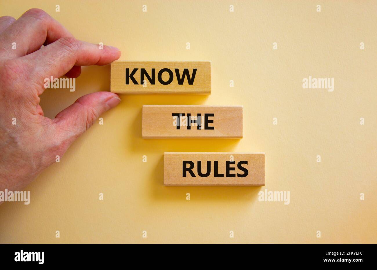 Know the rules symbol. Wooden blocks with words 'know the rules' on ...