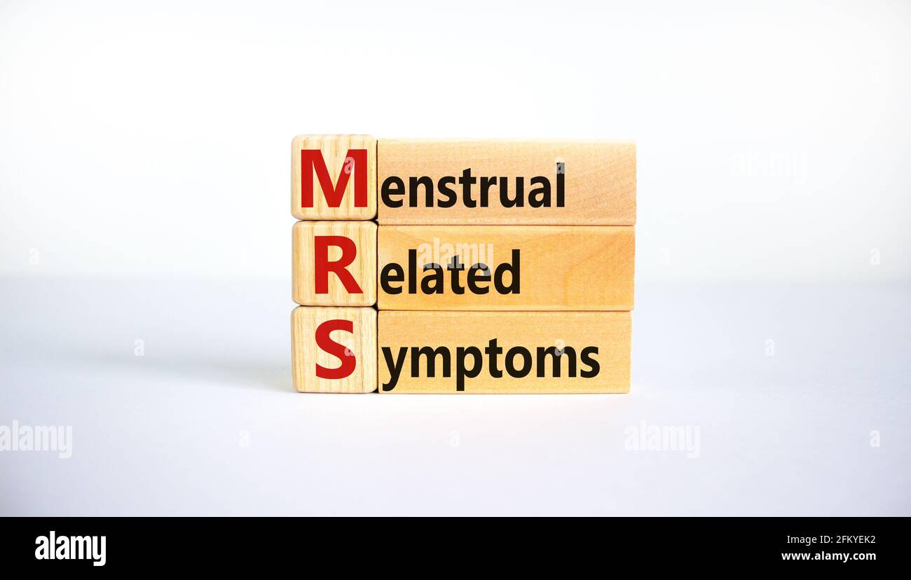 Medical and MRS, menstrual related symptoms symbol. Wooden blocks with ...