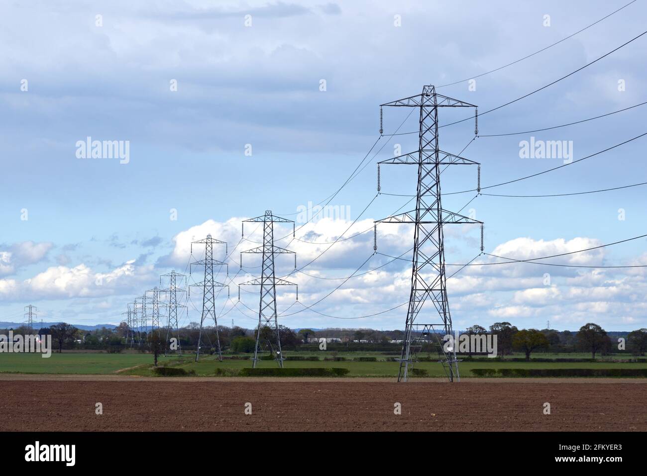 National Grid high Voltage electricity pylons crossing partially ...