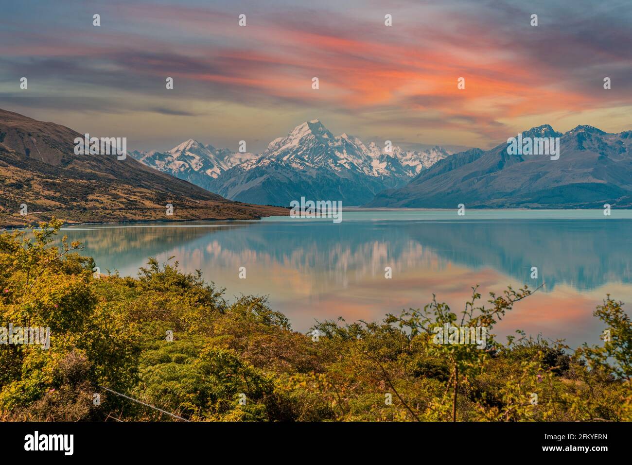 Scenic reflection of Mount Sefton and Mount Cook at lake Pukaki, South ...