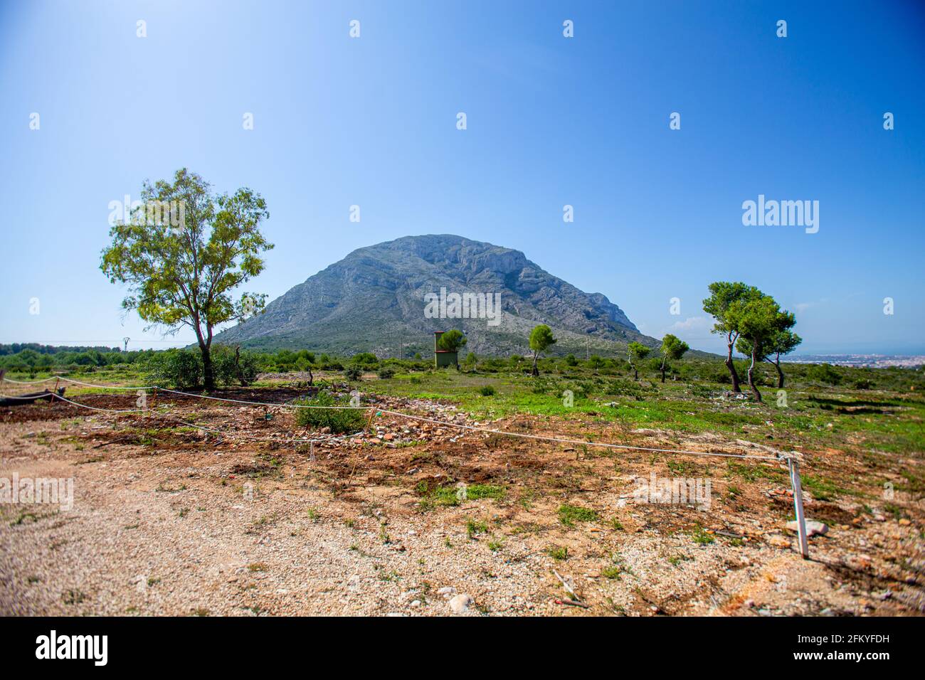 Closeup shot of an open landscape with a hill on a summer day Stock ...