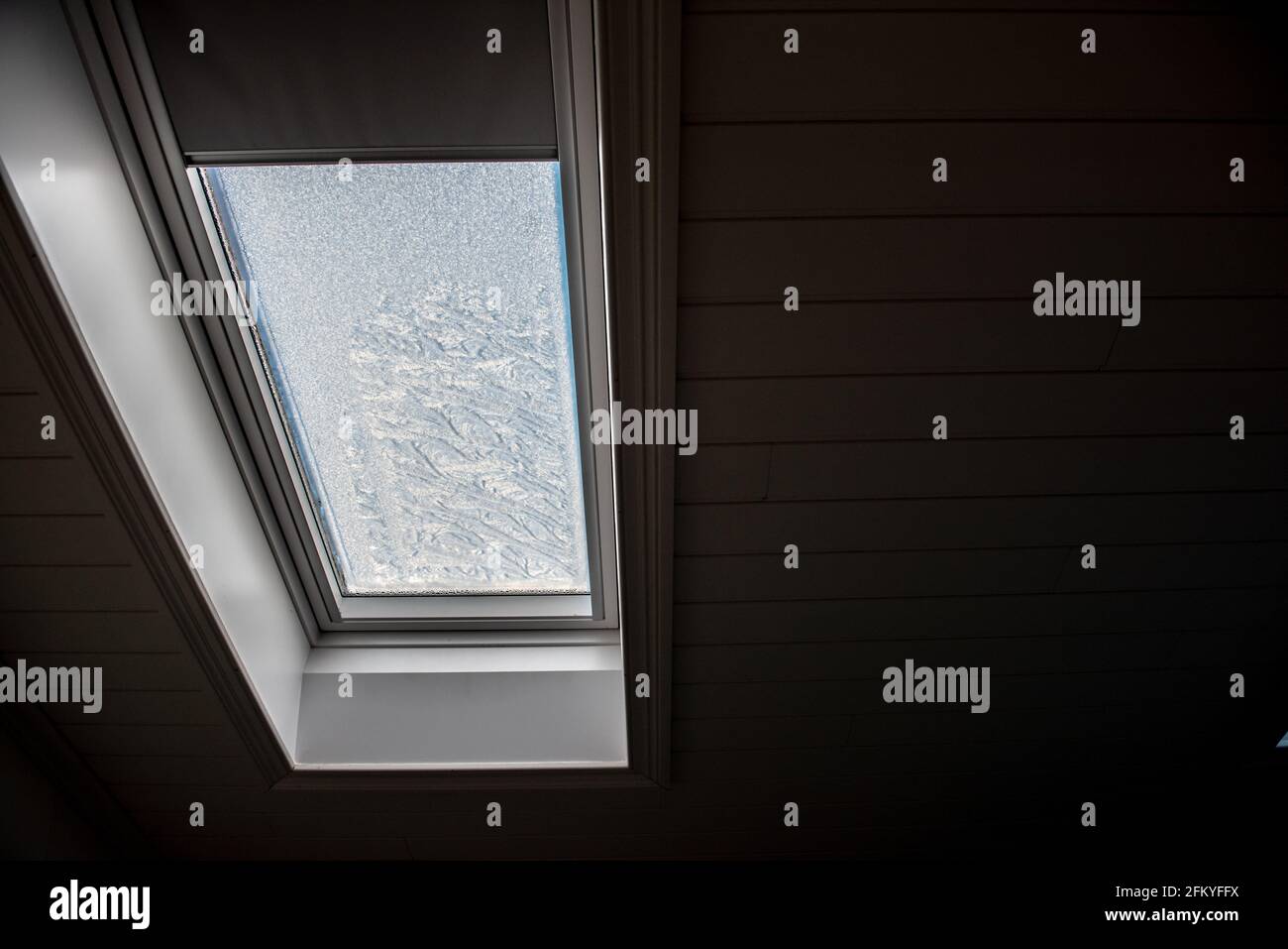 Roof window seen from the inside on a cold day Stock Photo - Alamy