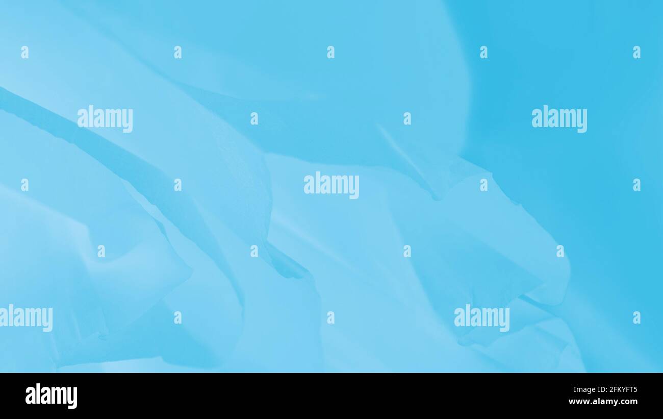 Light blue waves of flying fabric, blue panorama background Stock Photo ...