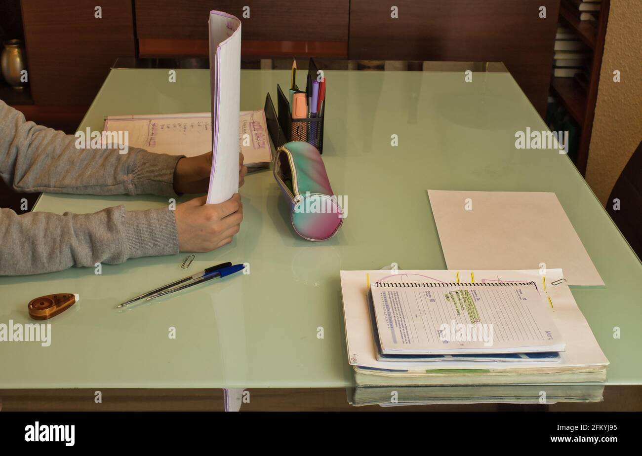 girl studying and doing homework with study tools Stock Photo - Alamy