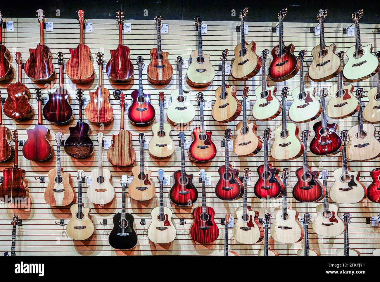 Wall of Acoustic Guitars Stock Photo - Alamy