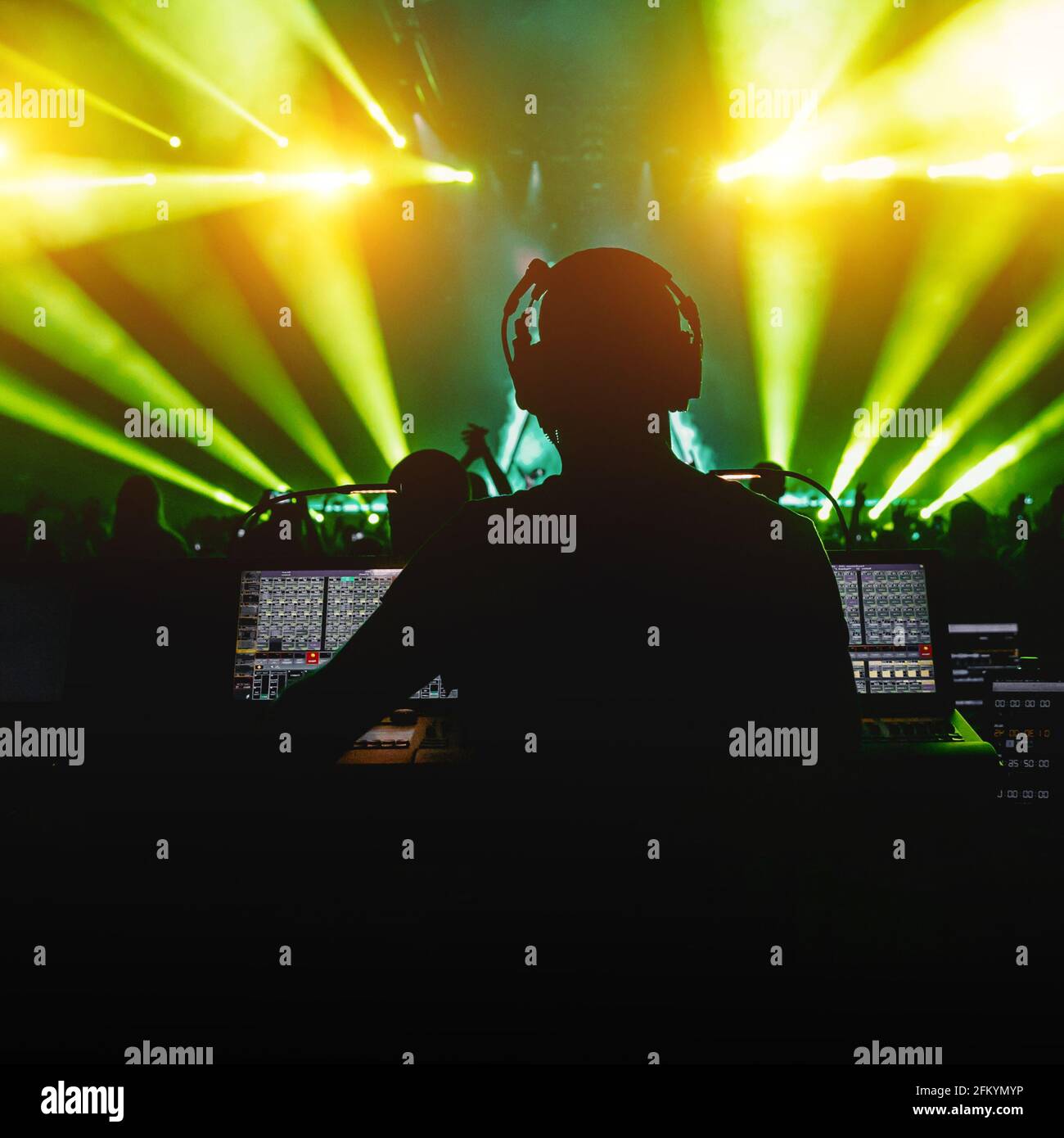Sound engineer working at mixing panel on a big concert Stock Photo - Alamy