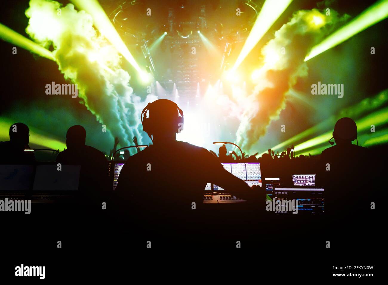 Sound engineer working at mixing panel on a big concert Stock Photo - Alamy