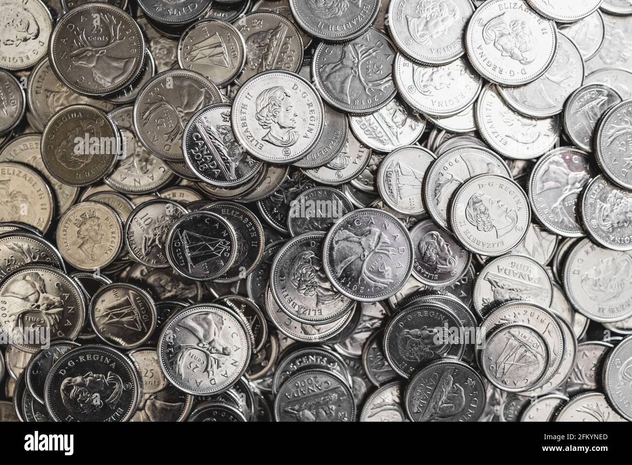 Horizontal background of silver shiny coins Stock Photo - Alamy