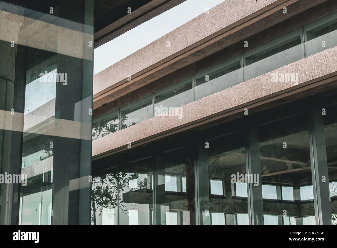 Beautiful view of modern glass wall building Stock Photo - Alamy