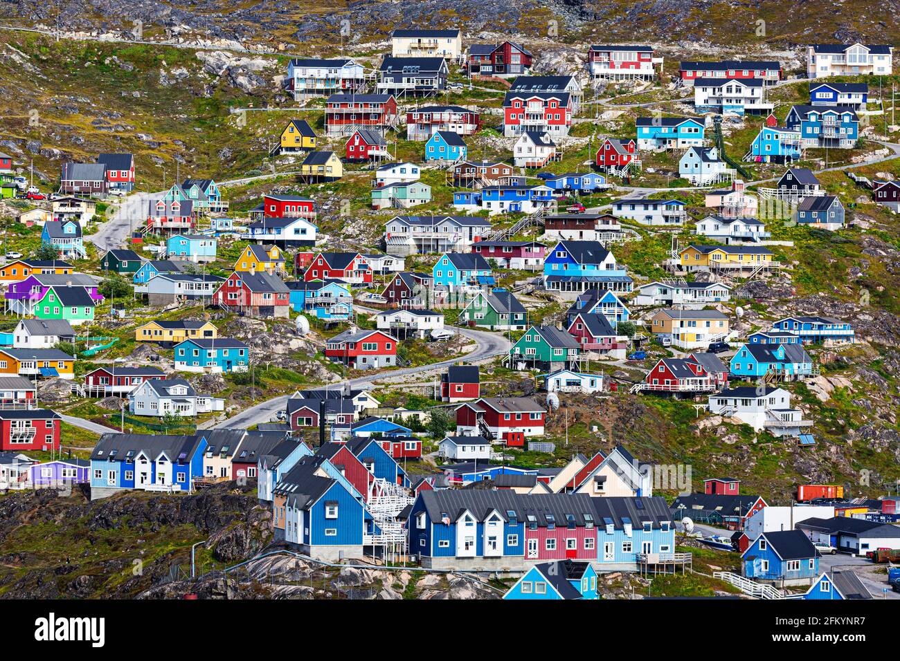 Colorful buildings in the small Greenlandic village of Qaqortoq ...