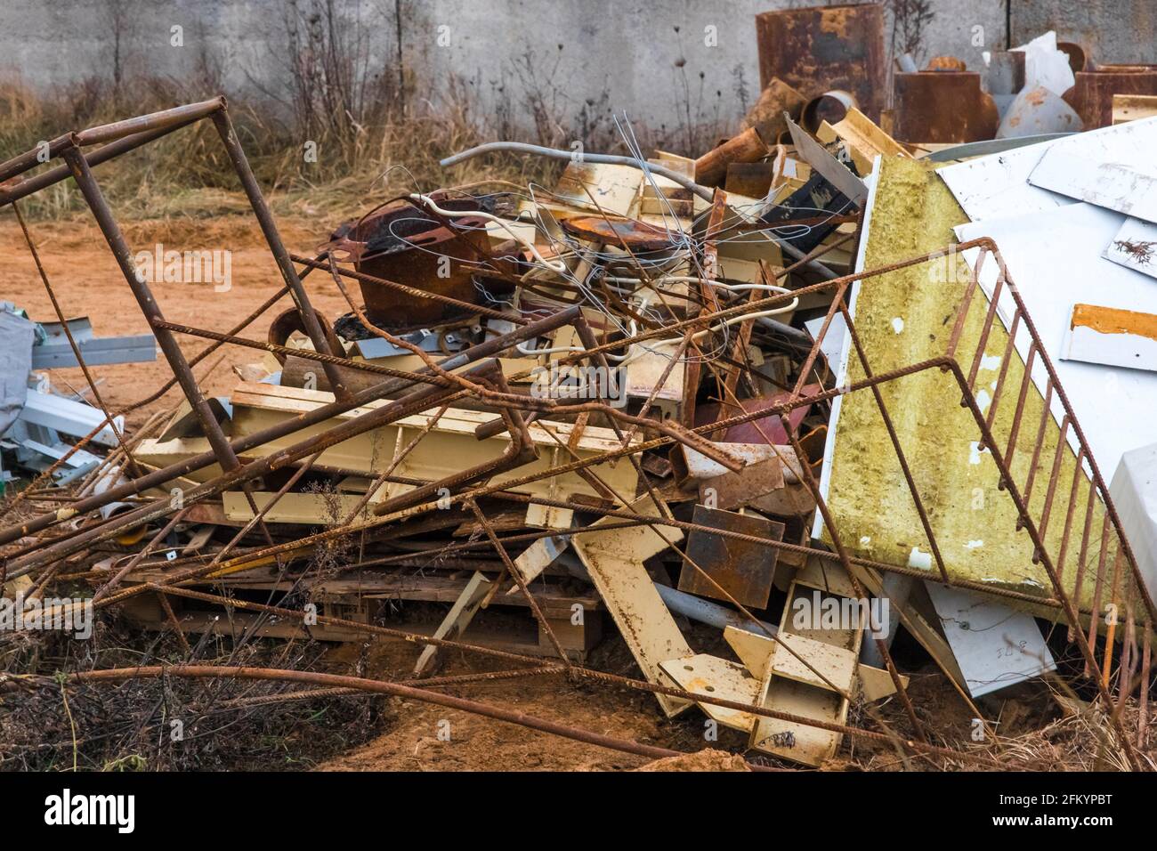 Storage of a pile of different industrial debris and waste in the open ...