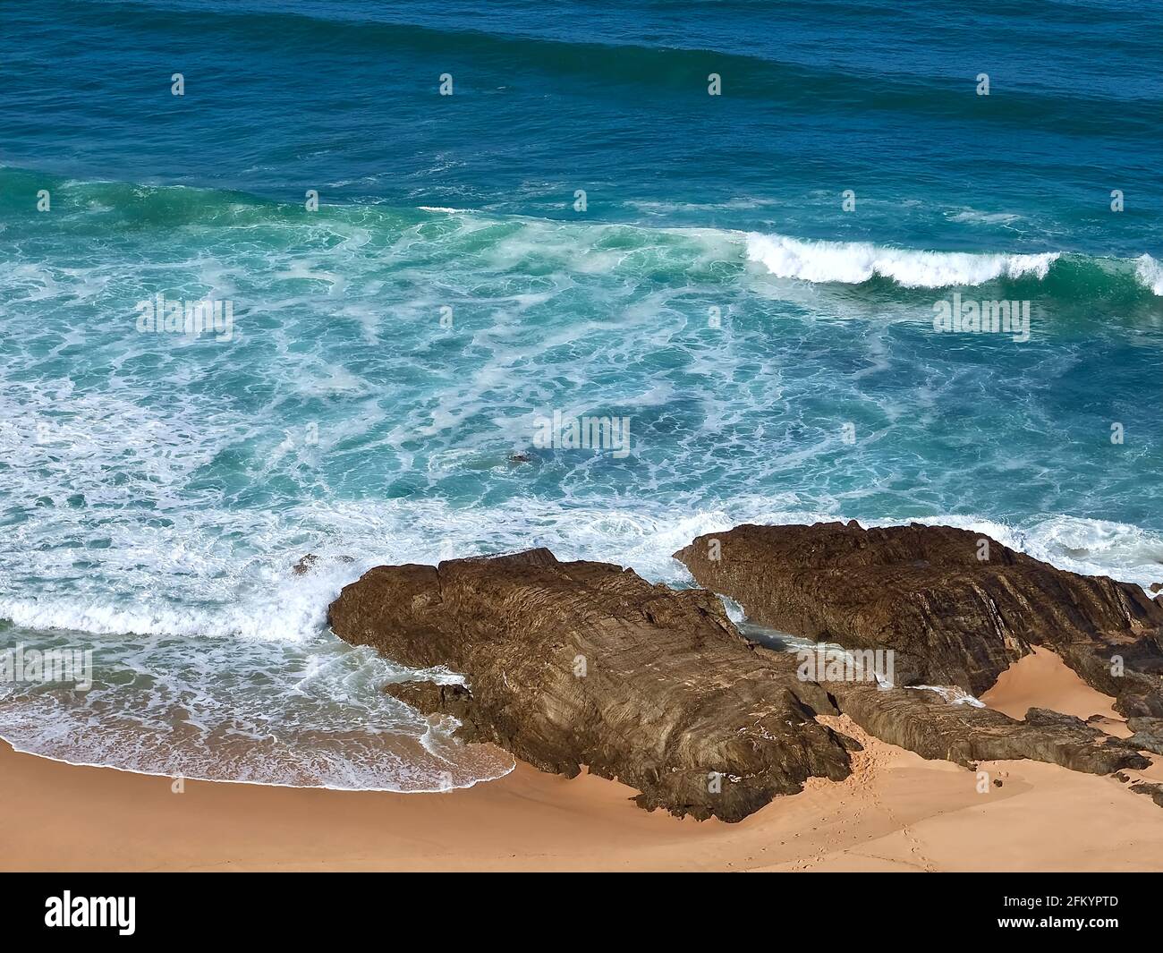 Beautiful seascape with two rocks in blue ocean Stock Photo - Alamy