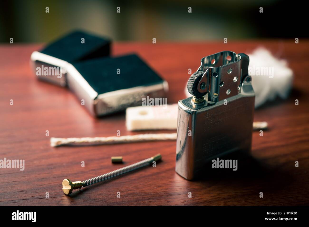 Disassembling of Lighter. Closeup at the flint. Shallow depth of field ...