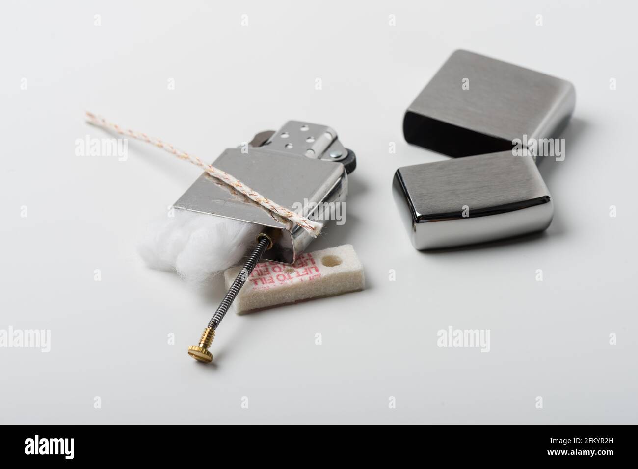Disassembling of Lighter with windproof over white background Stock ...